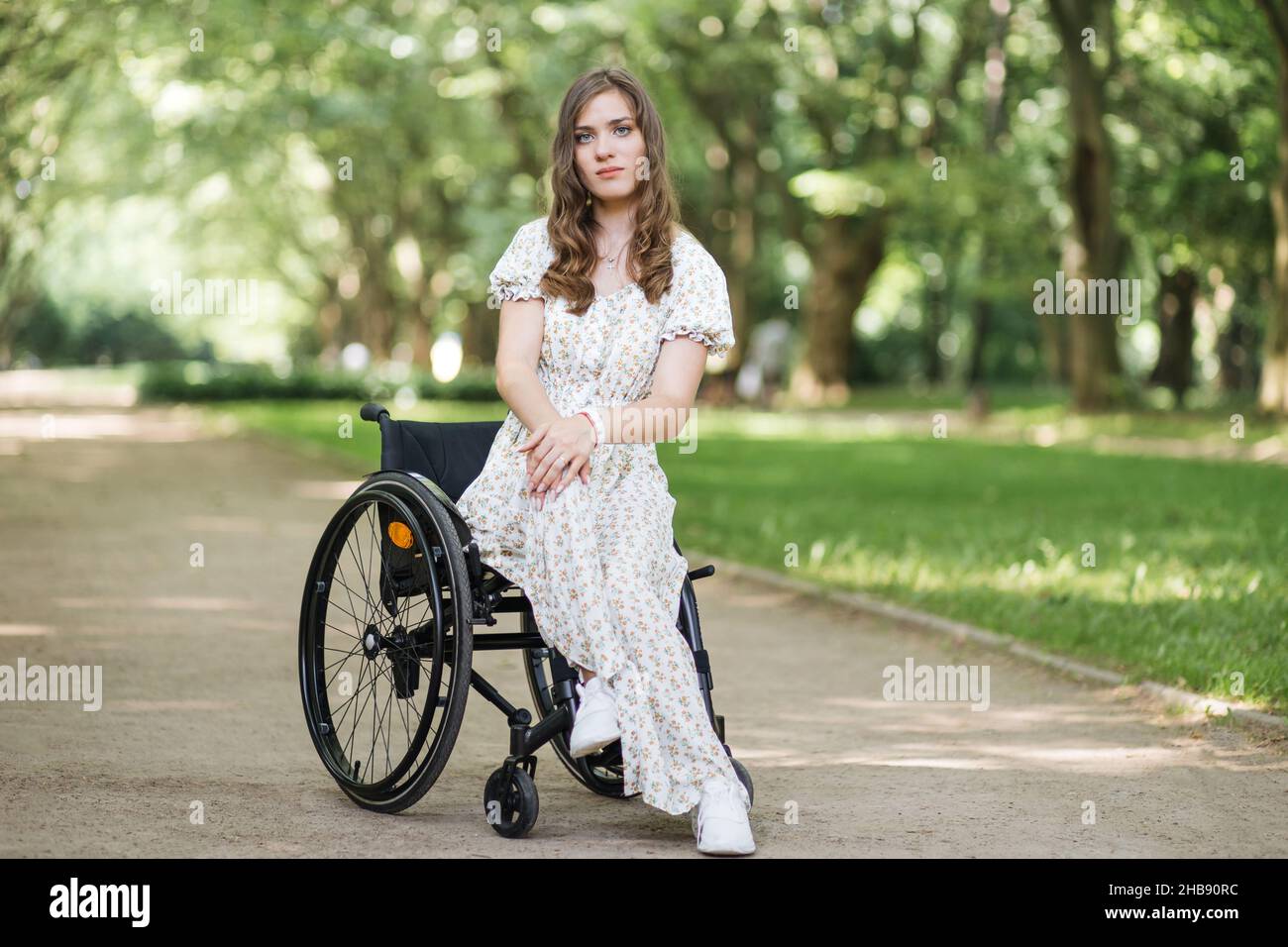 Beautiful caucasian woman with physical disability spending leisure ...
