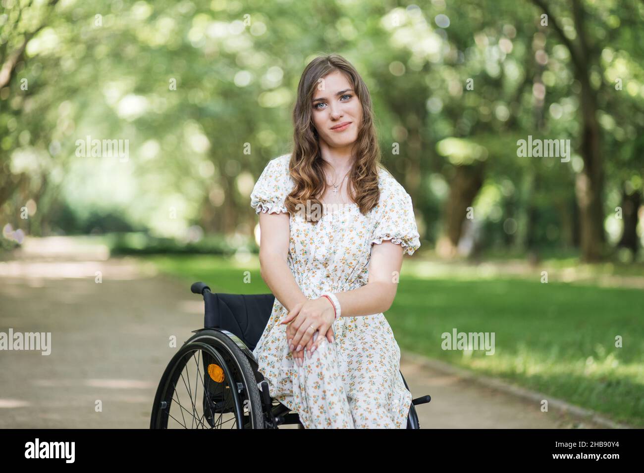 Beautiful caucasian woman with physical disability spending leisure ...