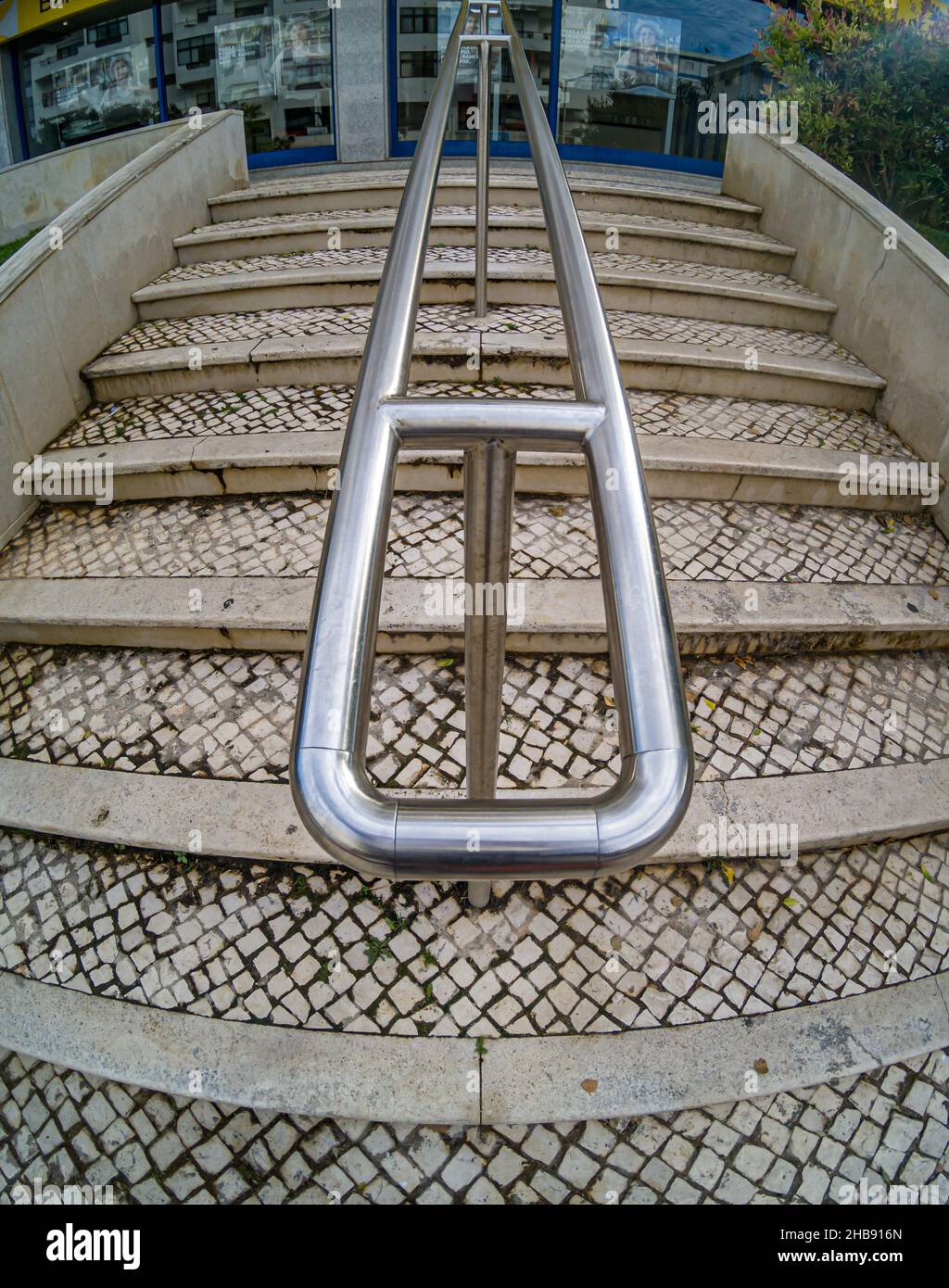 Paved staircase with metallic handrails on the street Stock Photo - Alamy