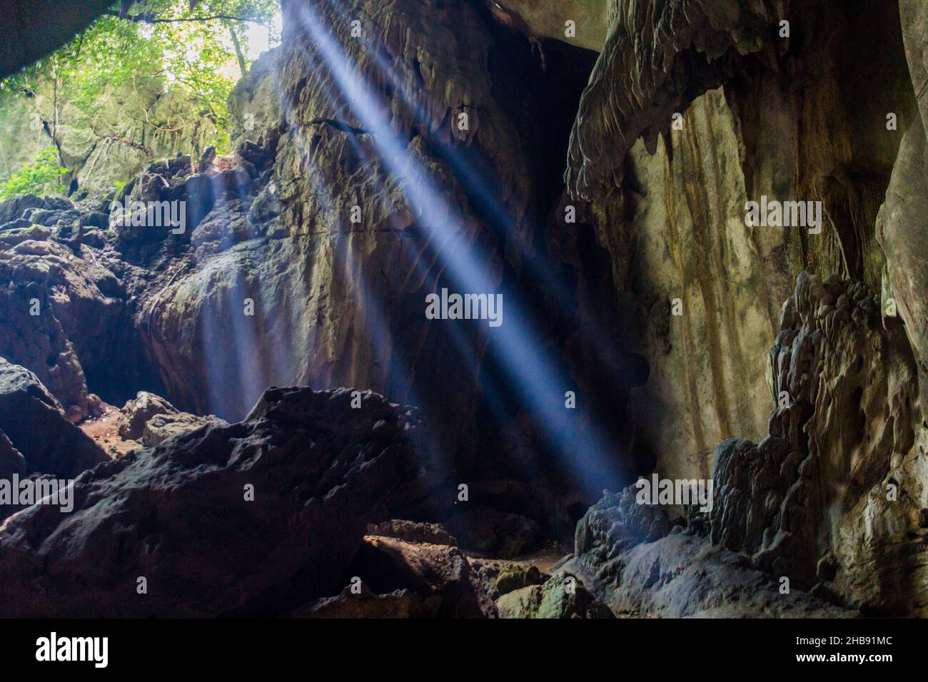Cave with light beams hi-res stock photography and images - Alamy