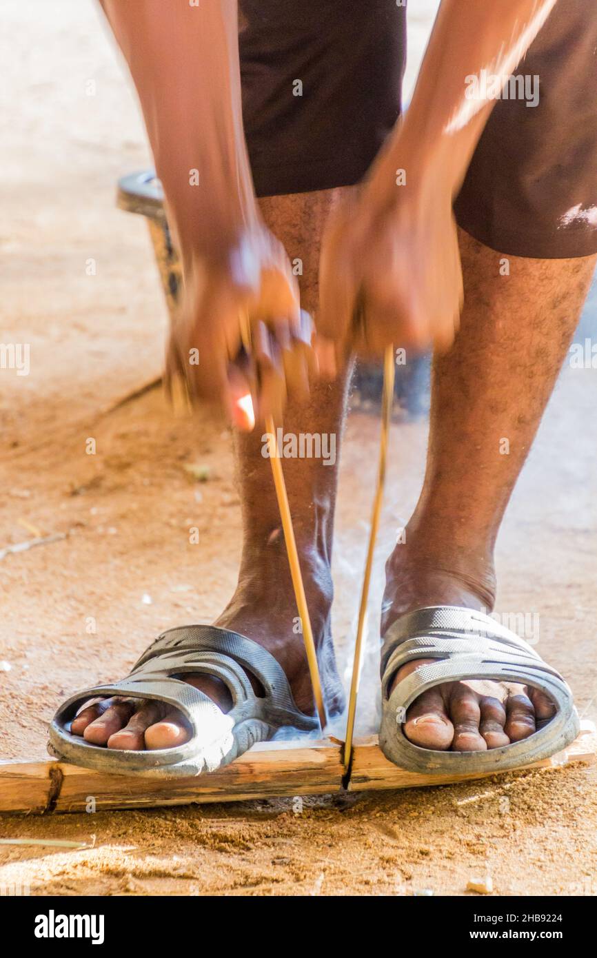 Indigenous people making fire hi-res stock photography and images - Alamy
