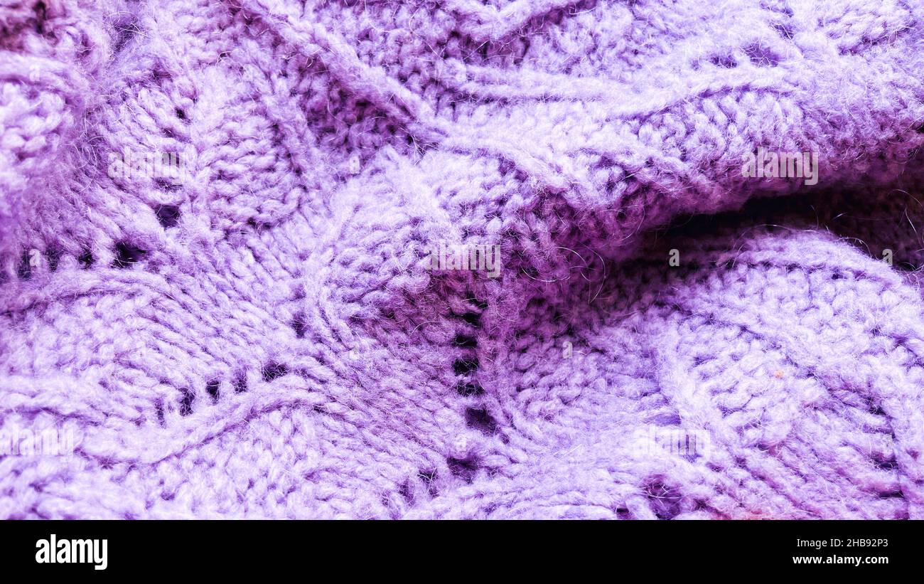 Violet knitted surface close up, concept color of the year 2022 Stock ...