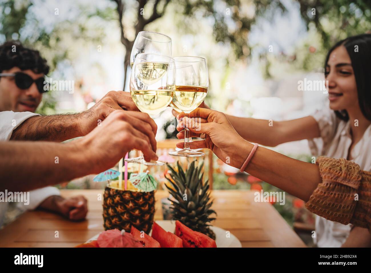 Family and friends toasting wineglasses hi-res stock photography and ...