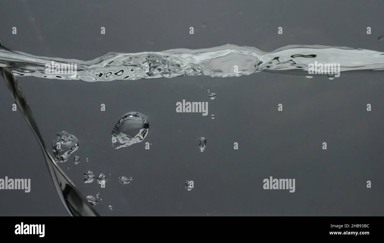 Soda water bubble splashing and floating drop. Represent sparkling and refreshing. Close up soda ...