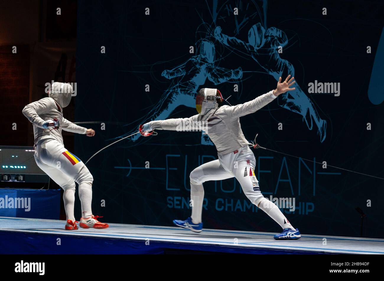 NOVI SAD, SERBIA - Jun 22, 2018: Two swordsmen fighting in fencing ...