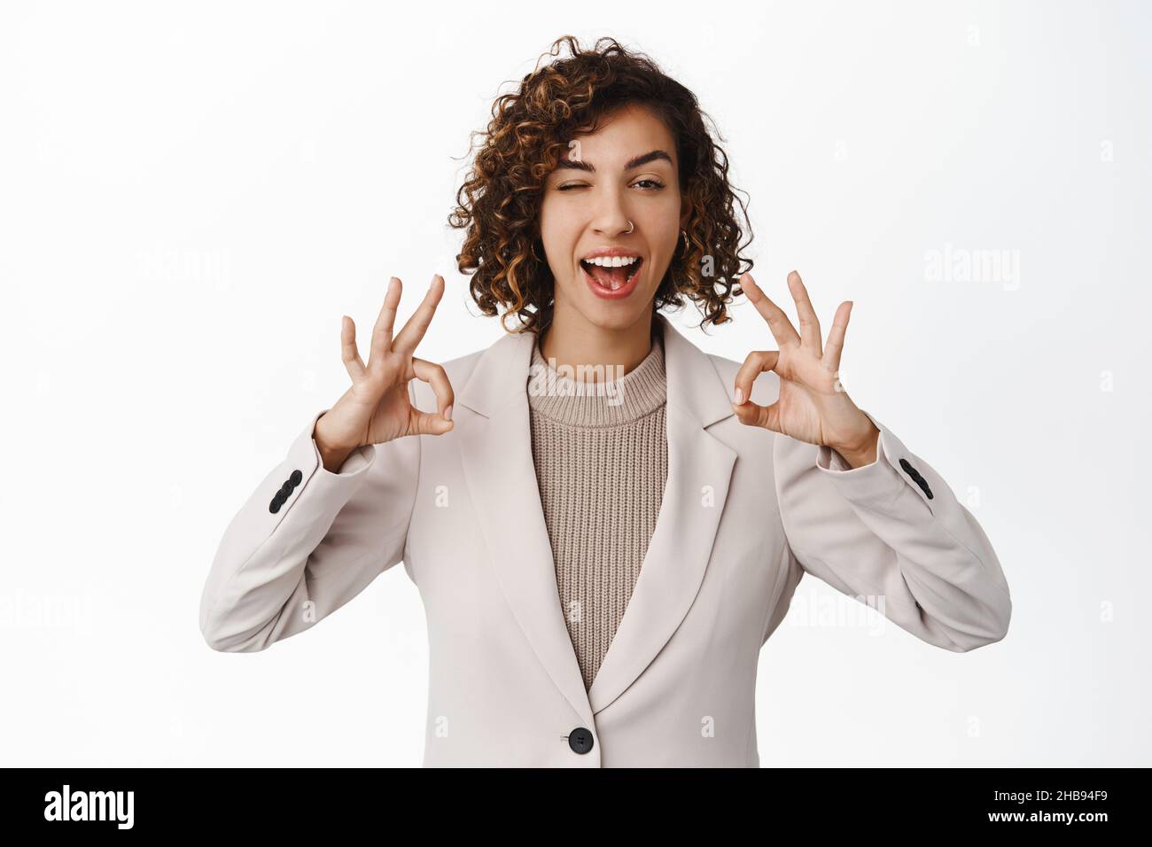 Okay, great job. Smiling successful businesswoman showing ok, zero ...