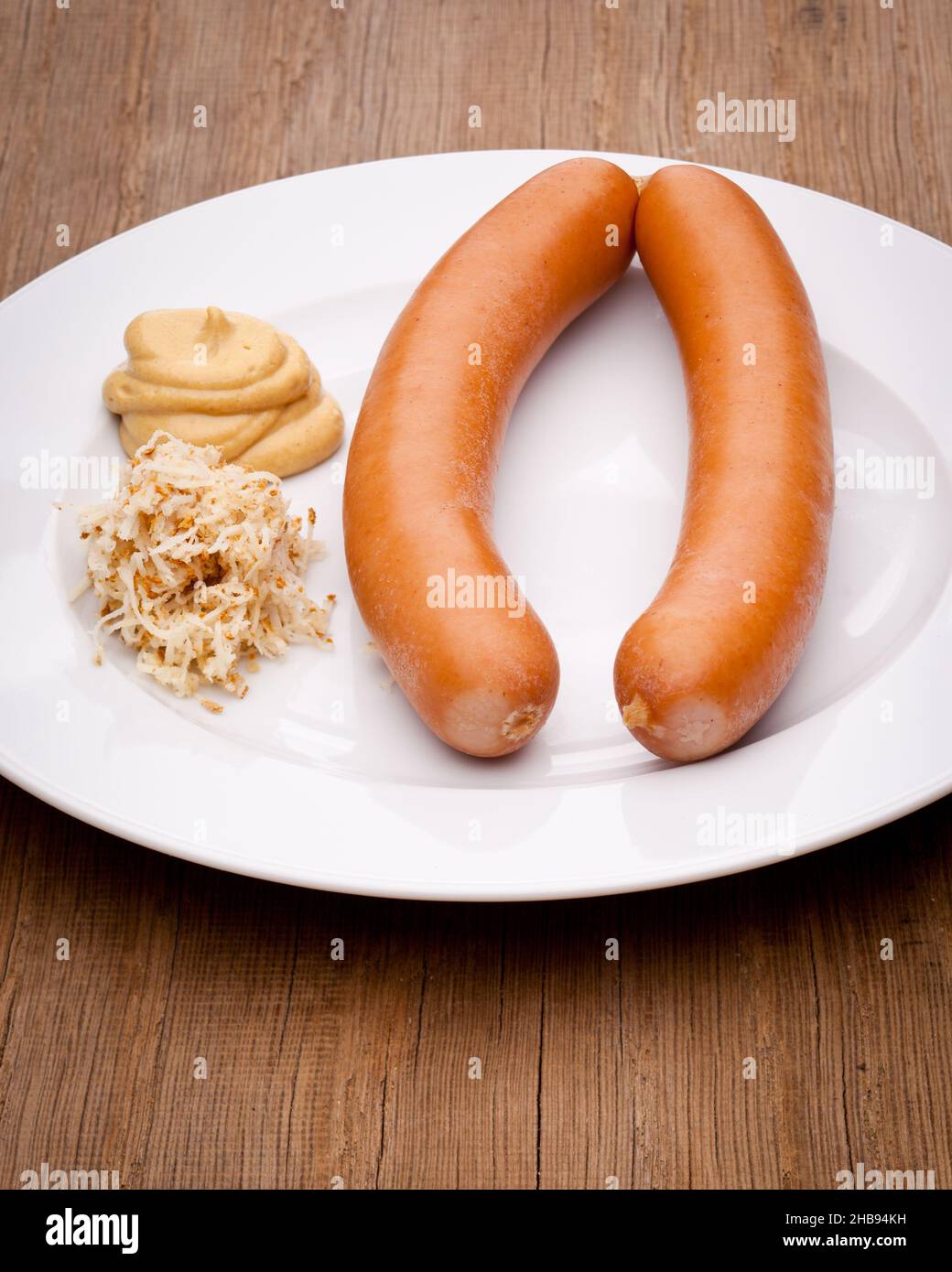 Vienna sausages with mustard and horseradish Stock Photo - Alamy