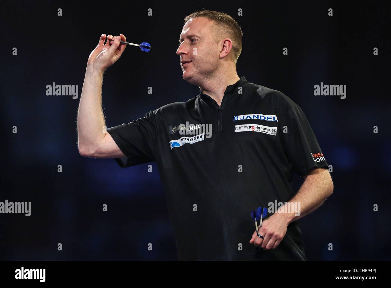 Joe Murnan in action during day three of the William Hill World Darts ...