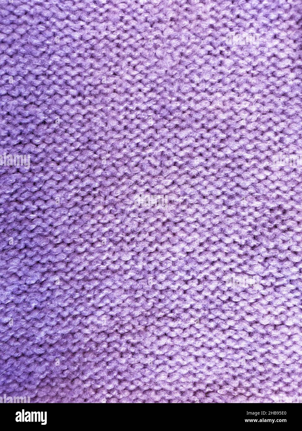 Violet knitted surface close up, concept color of the year 2022 Stock ...