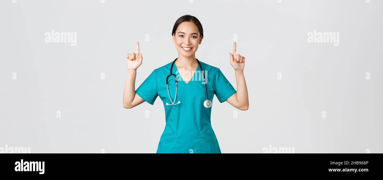 Covid-19, healthcare workers, pandemic concept. Happy smiling asian ...