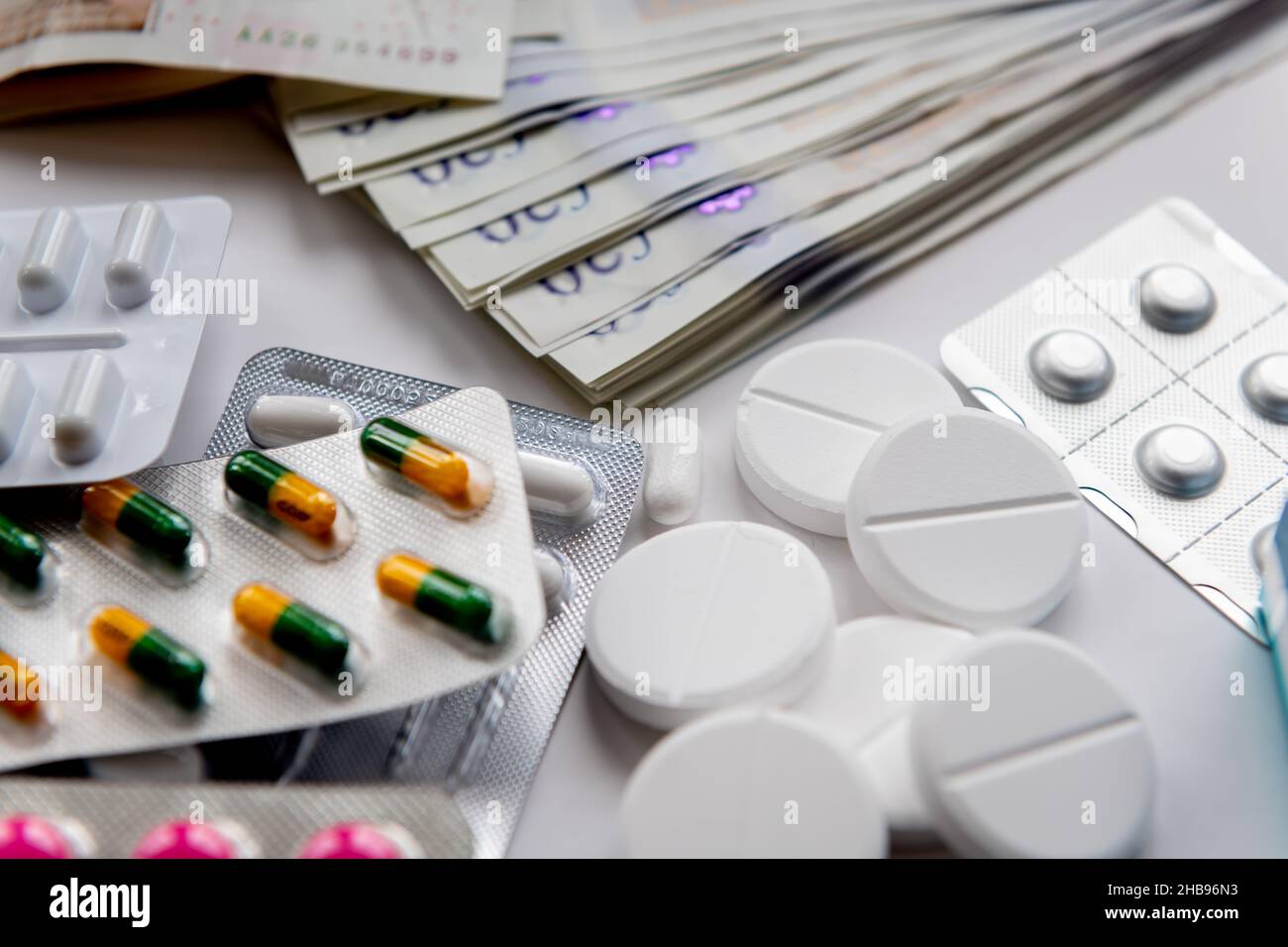 Money medicine hi-res stock photography and images - Alamy