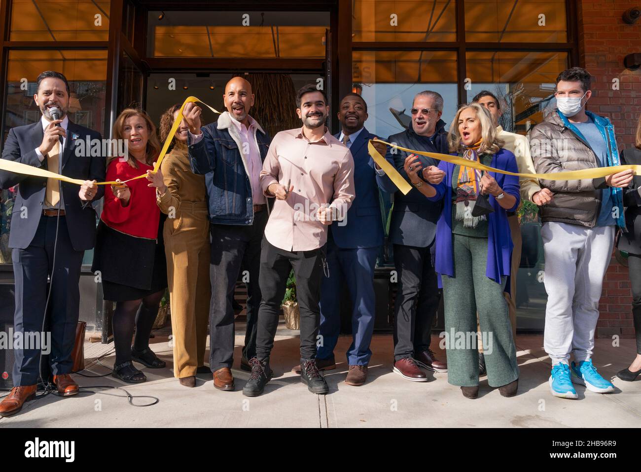 New York, NY - December 17, 2021: Ribbon cutting during grand opening ...