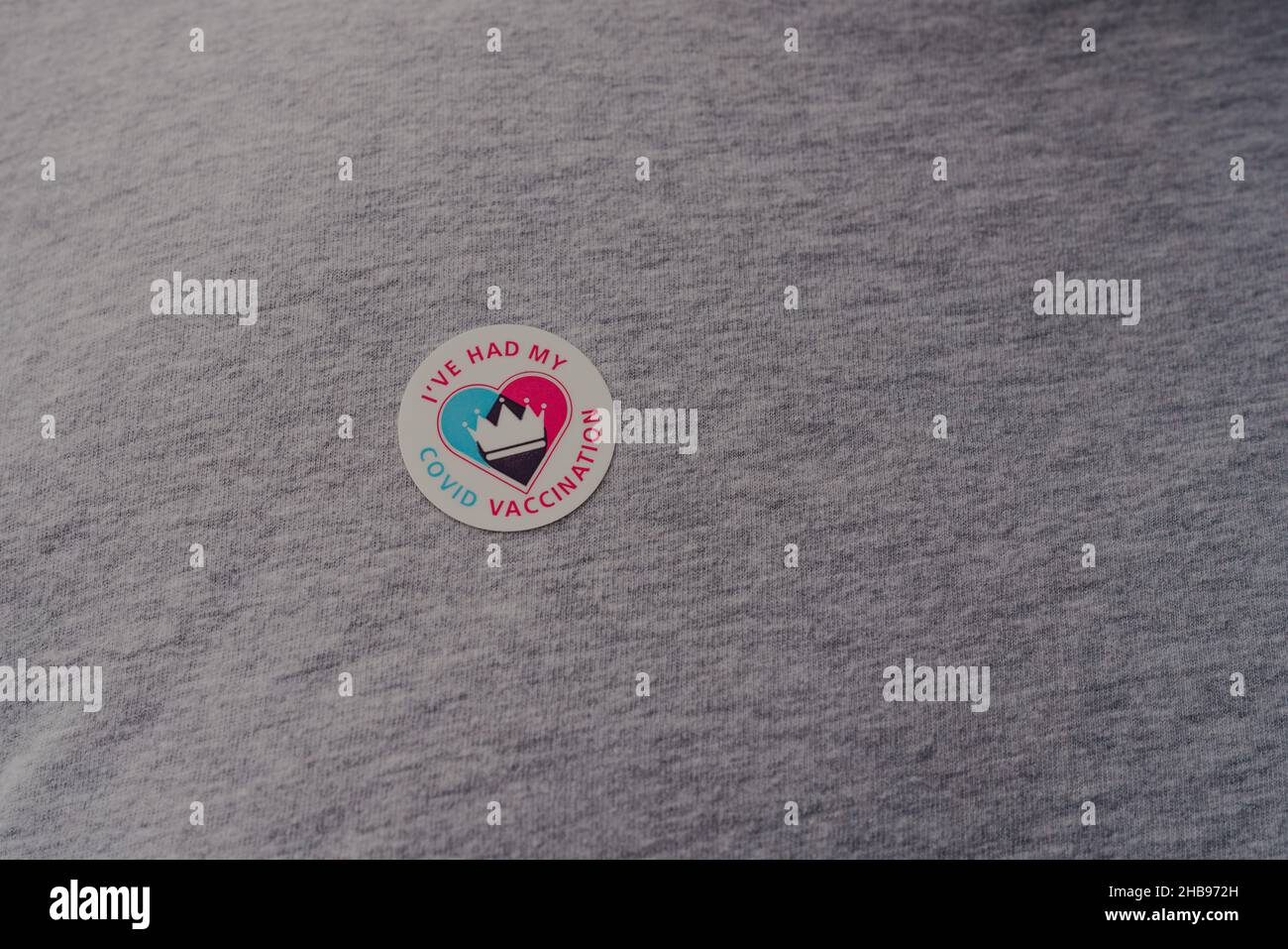 Nhs vaccine badge hi-res stock photography and images - Alamy