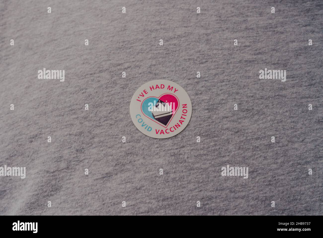 Nhs vaccine badge hi-res stock photography and images - Alamy