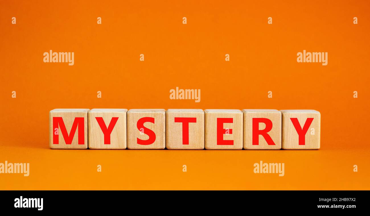 Mystery symbol. The concept word Mystery on wooden cubes. Beautiful ...