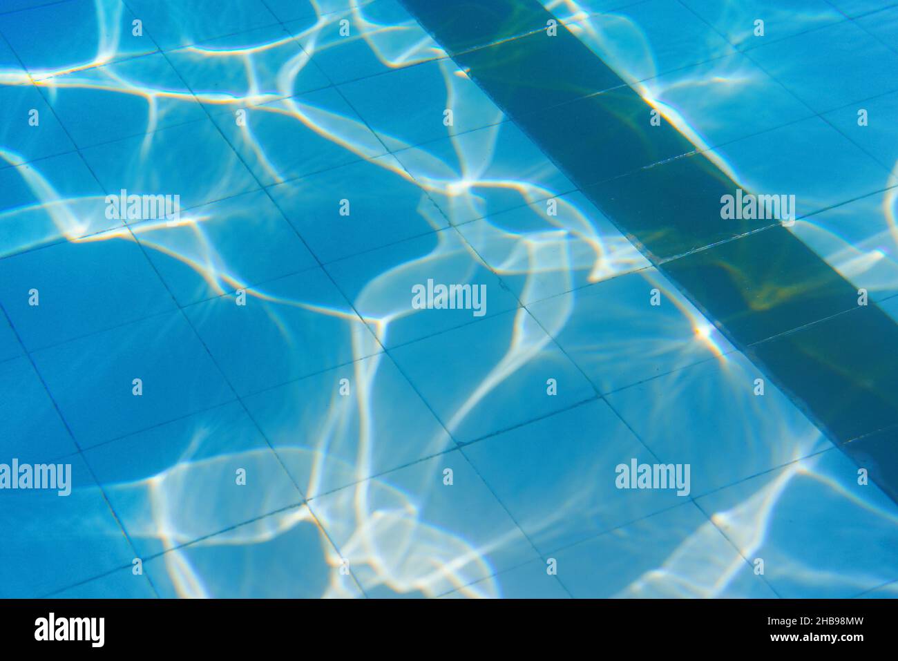 Calm water on empty swimming pool, dark lanes marks visible floor Stock ...