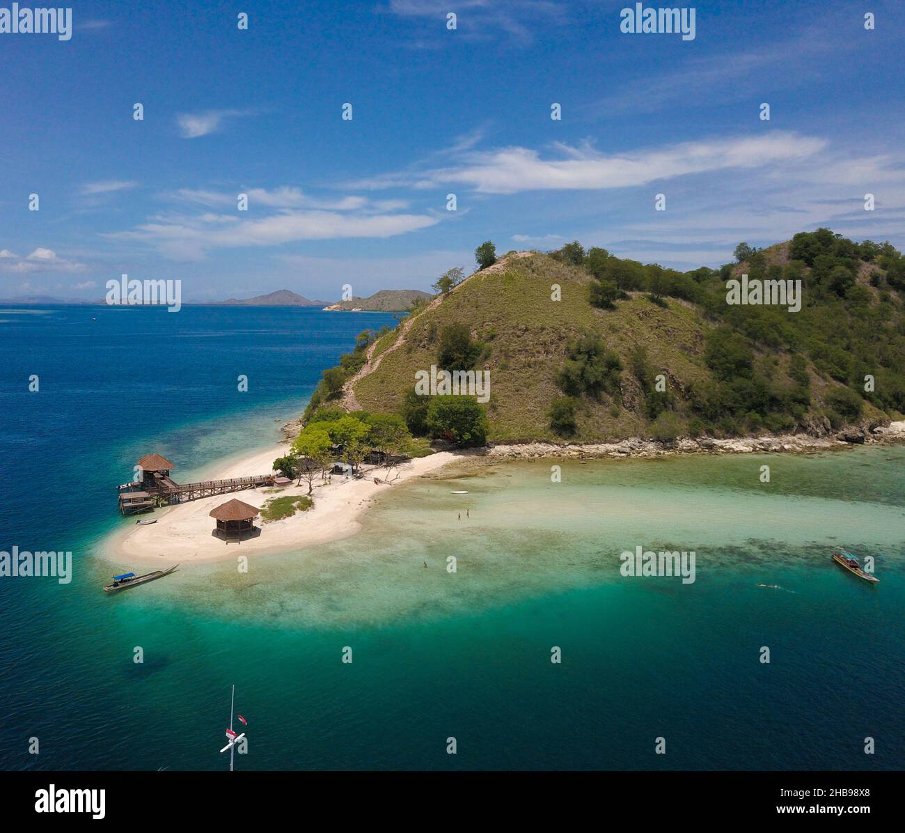 Aerial scenic view of an island with green nature in the middle of a ...