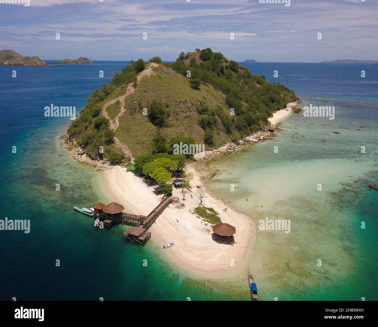 Aerial scenic view of an island with green nature in the middle of a ...