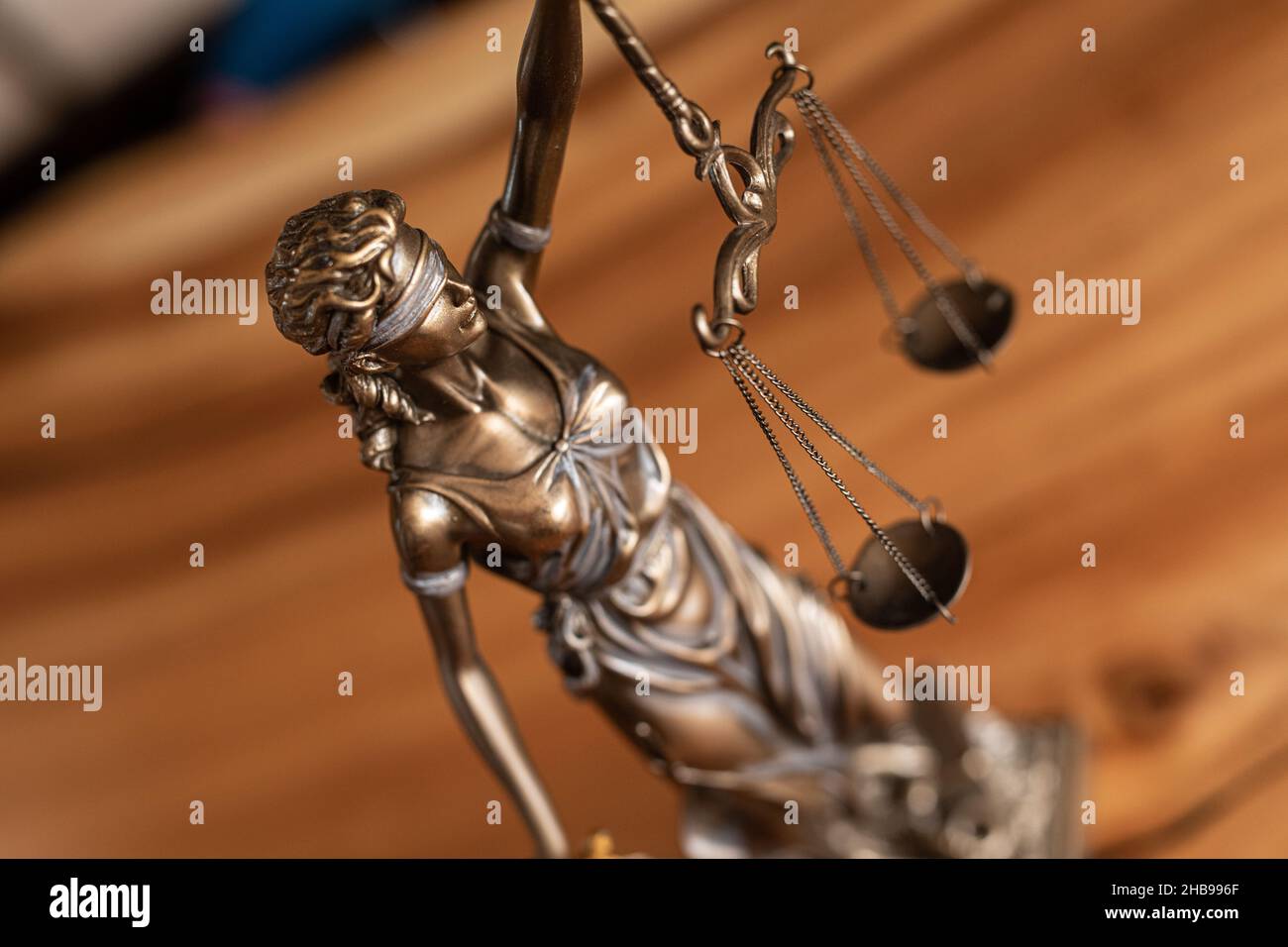 High angle shot of statue of a woman with scales as the symbol of law ...