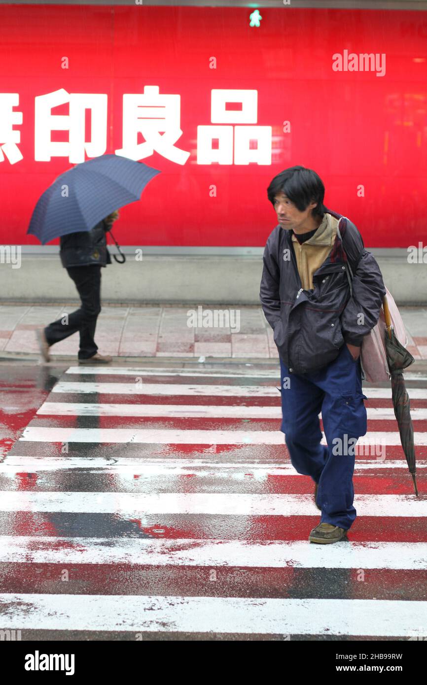 People in the rain in the streets view in Osaka japan in 2010 Stock ...