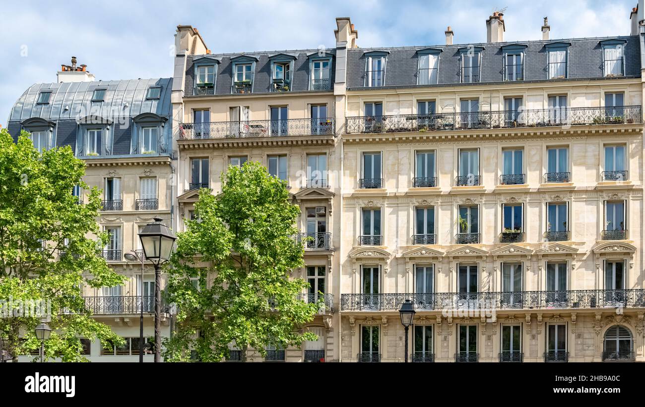 Paris, typical facades and street, beautiful buildings rue du Temple ...