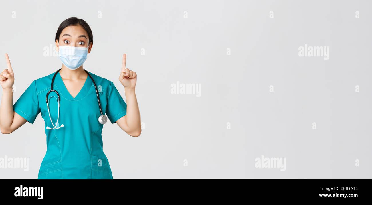 Covid-19, coronavirus disease, healthcare workers concept. Intrigued ...