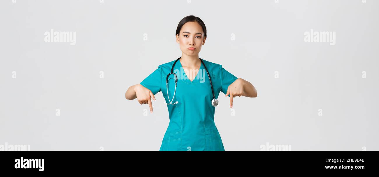 Upset patient pointing at nurse hi-res stock photography and images - Alamy