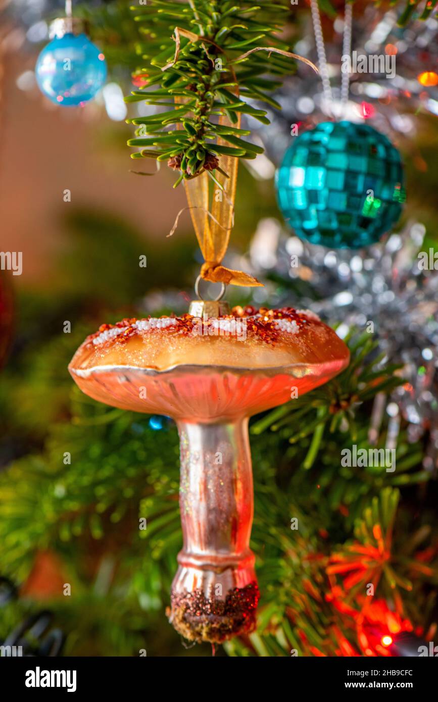 sparkling christmas decoration in the form of a mushroom fungi, festive ...