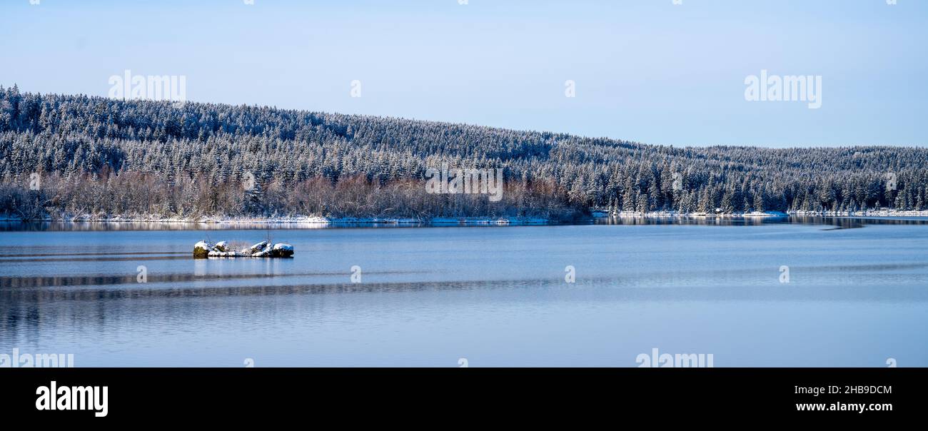 Winter scenery with mountain forests and water reservoir Stock Photo ...