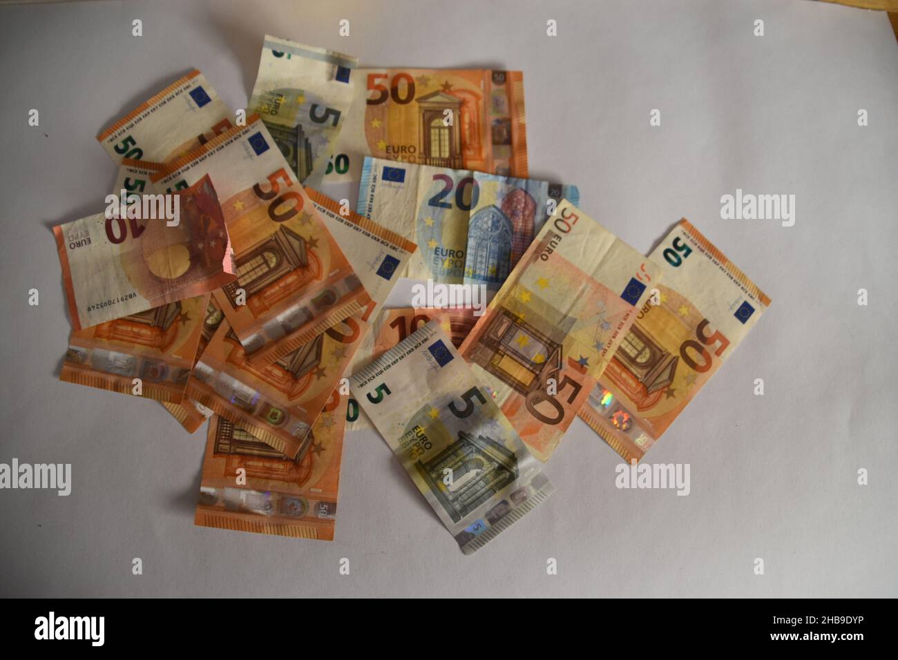 Pile of euro banknotes isolated on a white background Stock Photo - Alamy