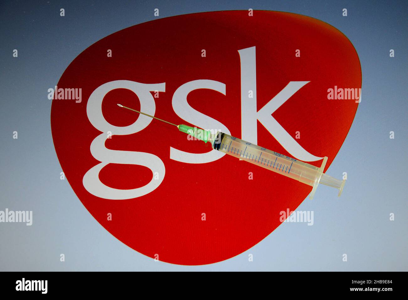 In this photo illustration a medical syringe seen displayed in front of ...