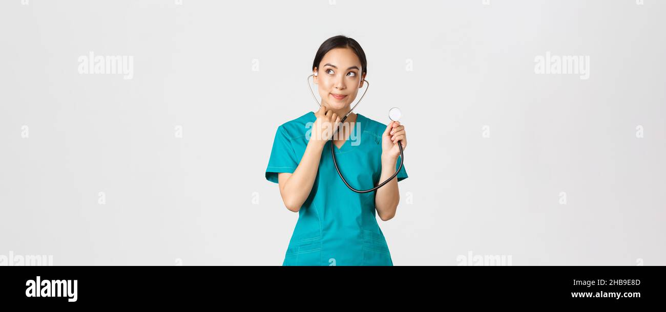 Covid-19, healthcare workers and preventing virus concept. Cute smiling ...