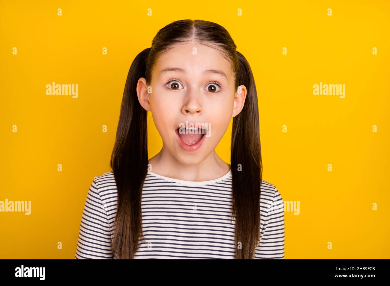 Photo of young attractive school girl amazed shocked surprised fake ...
