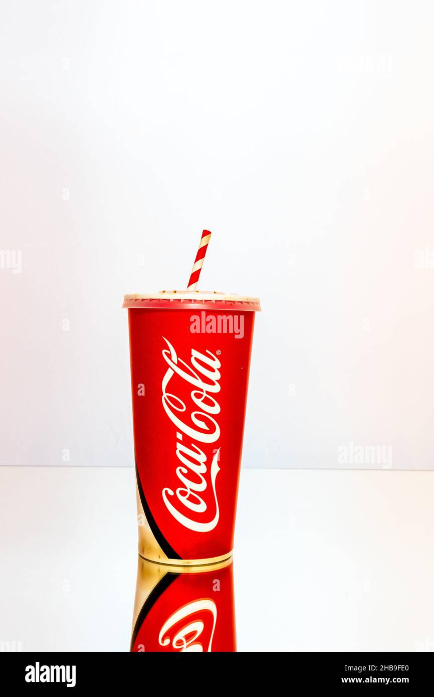 Coca Cola paper cup. Illustrative editorial photo in studio in ...