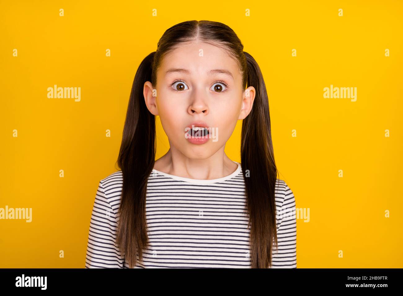 Photo of young school girl amazed surprised afraid scared fail mistake ...