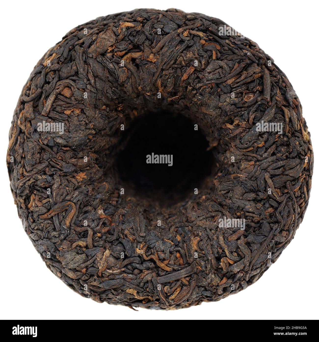 Ripe black puerh tea bowl shape tuo cha closeup isolated Stock Photo ...