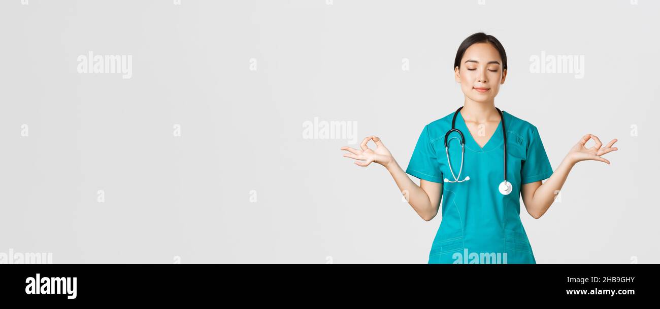 Covid-19, healthcare workers and preventing virus concept. Calm and ...