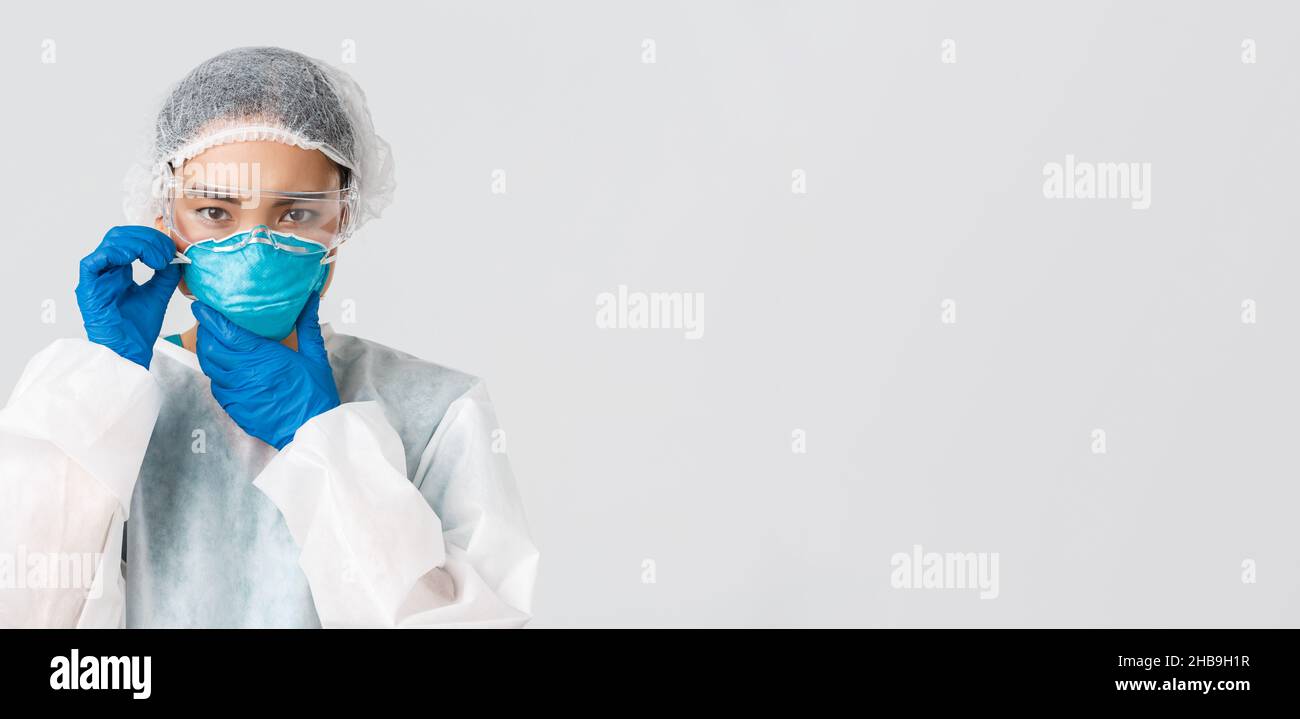 Covid-19, coronavirus disease, healthcare workers concept. Serious ...