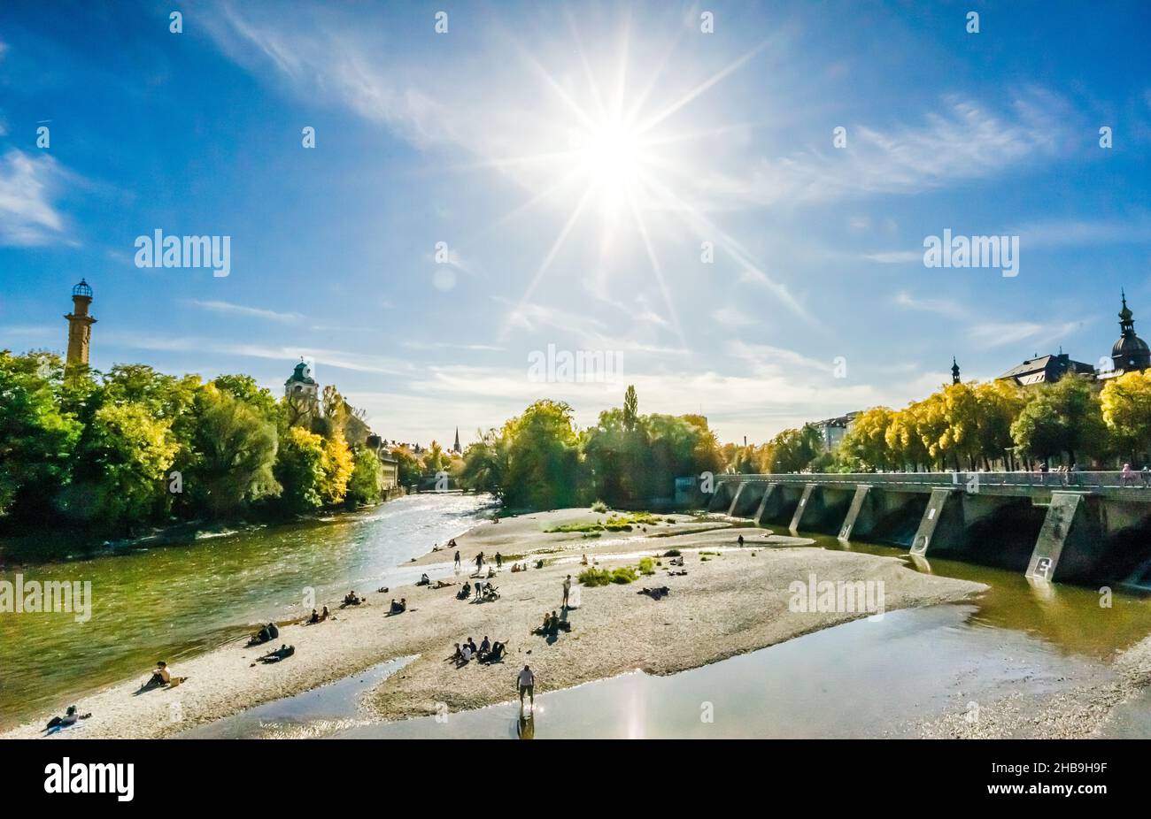 Blue sky and sun on the Isar river in Munich Stock Photo - Alamy