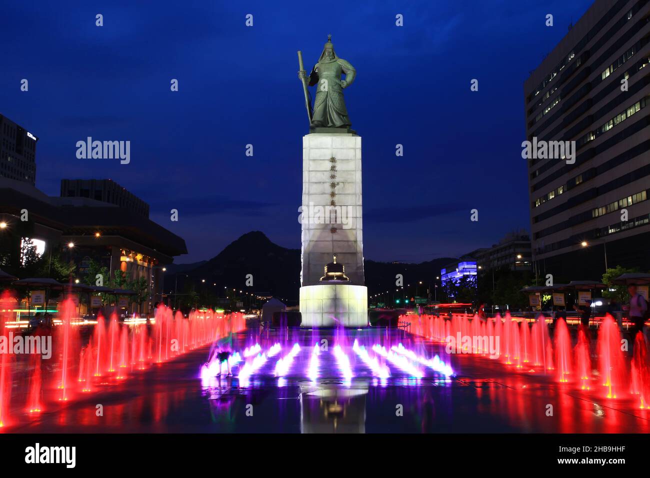 The bronze statue of Admiral Yi Sun Shin in Seoul at night with the ...