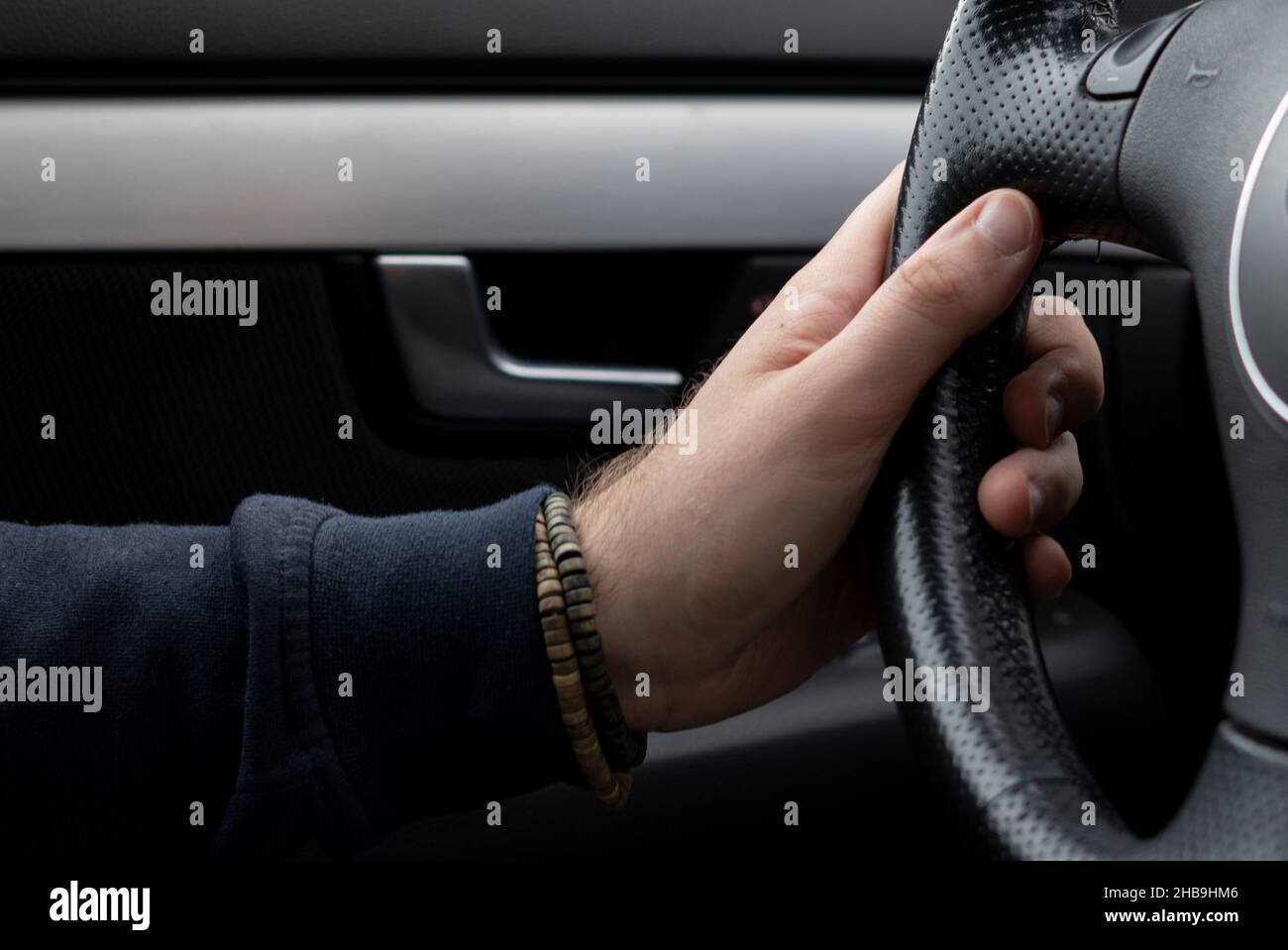 Male hand steering wheel hi-res stock photography and images - Alamy