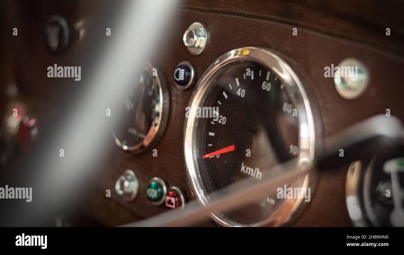 Colorful vintage car dashboard speed barometer Stock Photo - Alamy