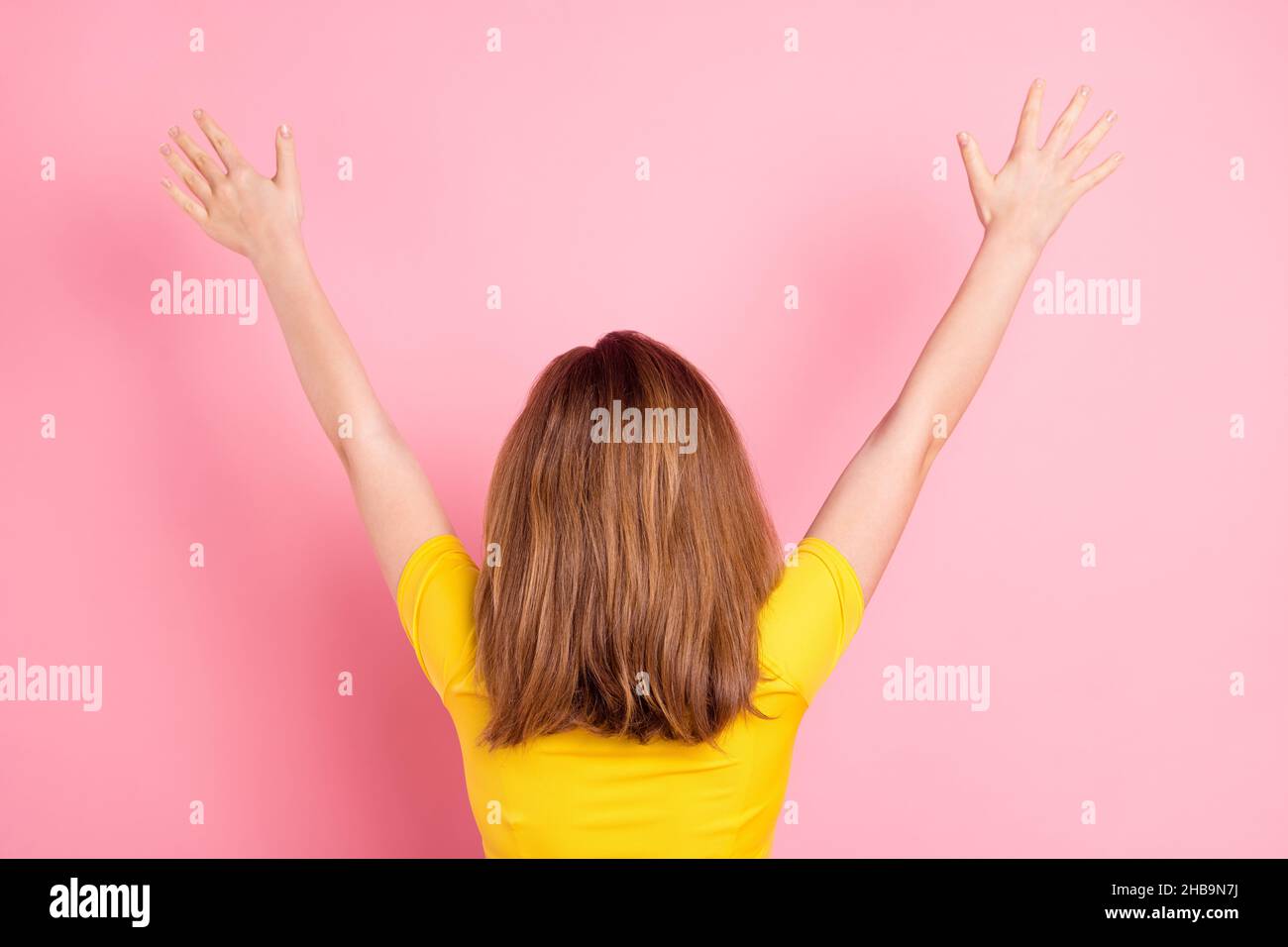 Back rear side photo of young school girl raise hands anonym incognito ...