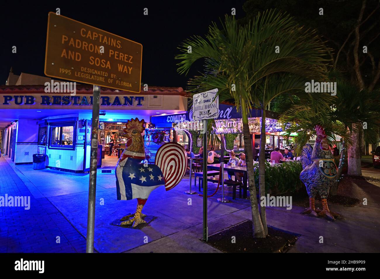 Miami, Florida - December 11, 2021 - Night time street scene on Calle ...