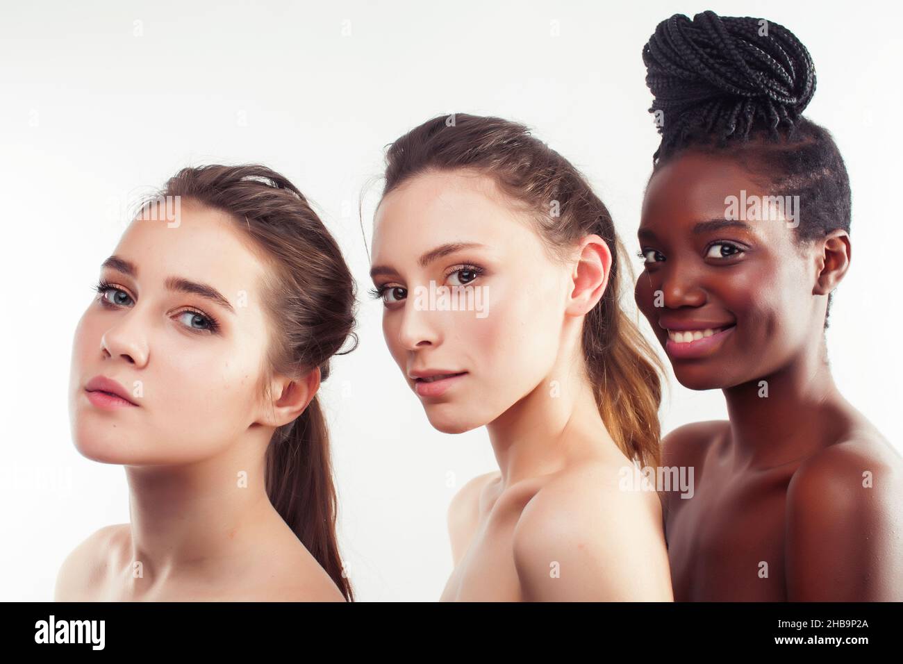 three different nation woman: african-american, caucasian together ...