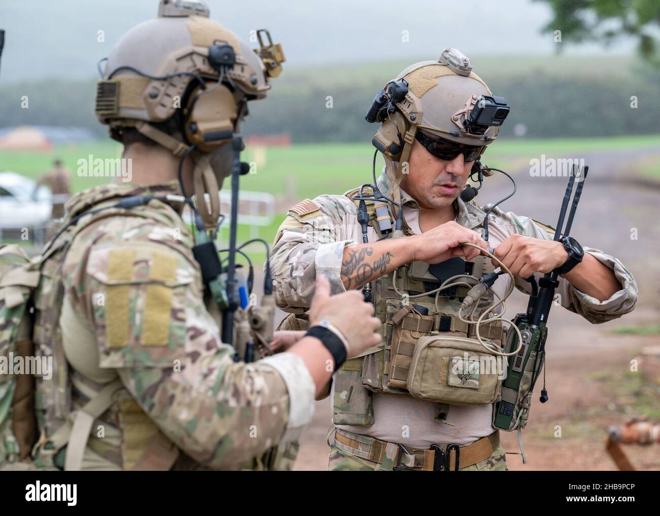 U.S. Air Force Tech. Sgt. Cristobal Galindo, right, 25th Air Support ...