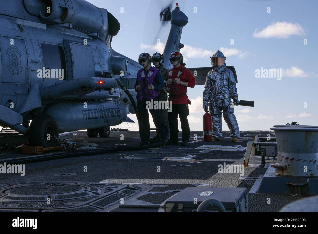 211211-N-ED646-0166- ATLANTIC OCEAN (Dec. 11, 2021) Sailors refuel an ...