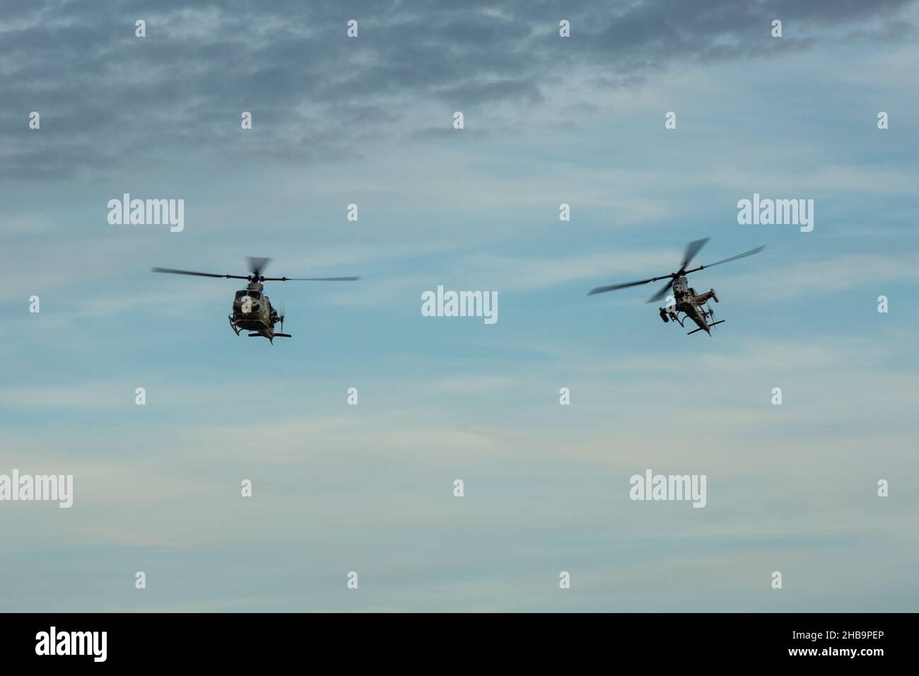 A U.S. Marine Corps UH-1Y Huey and AH-1Z Viper assigned to Marine Light ...