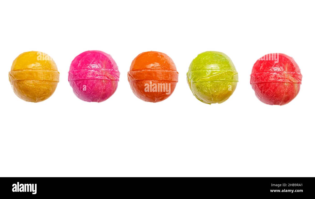Lollipops on an isolated white background. Mix of multi-colored candy ...