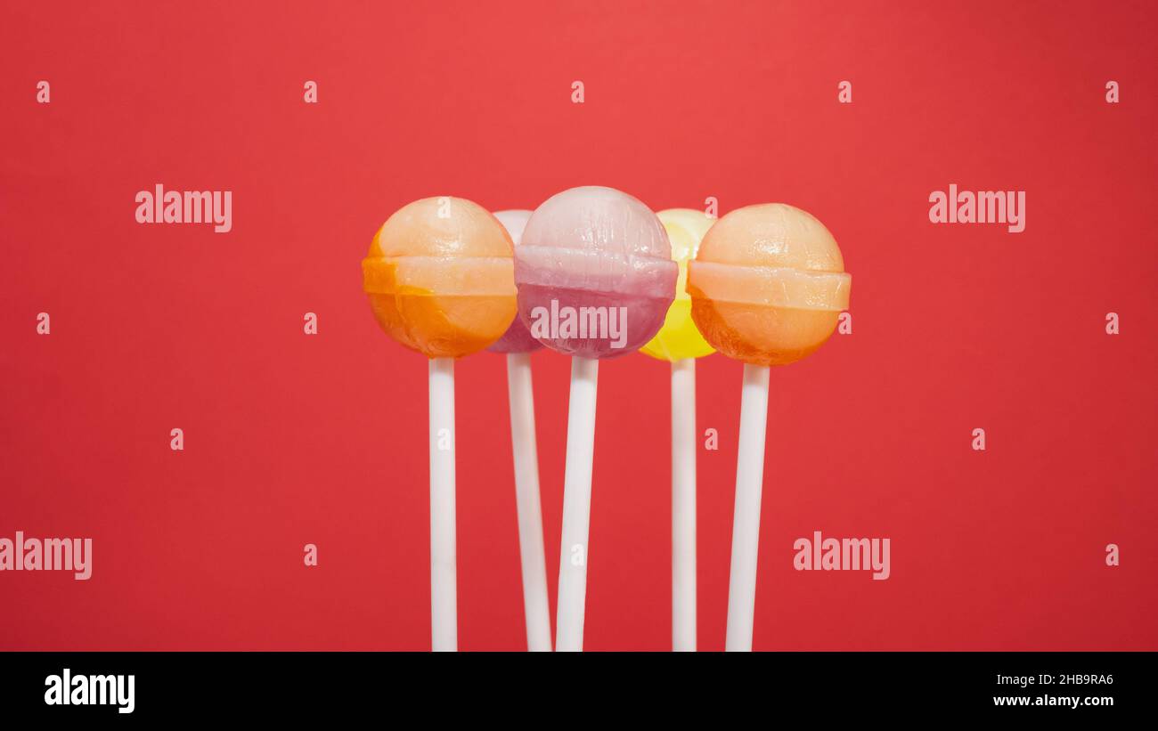 Mix of multicolored lollipops, lollipops copy space, kids candy ...